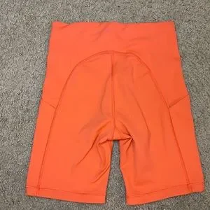 Athleta | Shorts | Athleta Coral Orange Ultimate Stash Pocket 7 Short ...